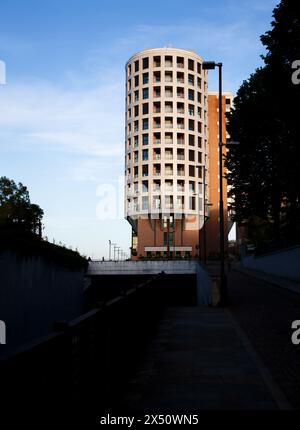 Modern cylindrical building captured at sunset Stock Photo - Alamy