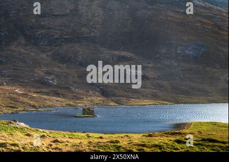 Macleod's Tower in Loch Tangasdale, Ilse of Barra, Scotland Stock Photo ...