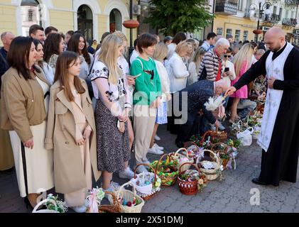 A priest blesses Easter baskets during the celebration of Orthodox ...