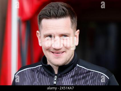 Lee Bell, Manager of Crewe Alexandra applauds the fans following a 0-0 ...