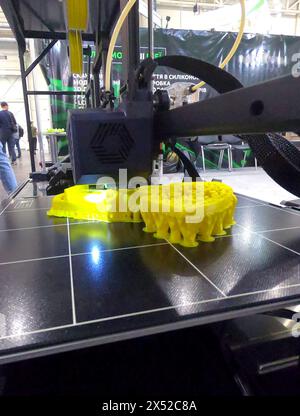 3D printer or additive manufacturing and robotic automation technology ...