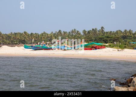 Colourful fishing boats on Marari Beach, Mararikulam, Alappuzha ...