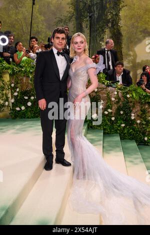 Gus Wenner and Elle Fanning arriving at the 83rd Annual Golden Globes ...