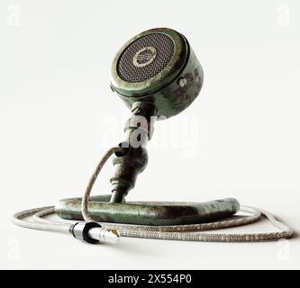 A vintage antique desk microphone on an isolated white background - 3D ...
