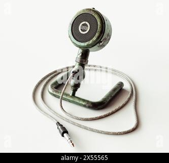 A vintage antique desk microphone on an isolated white background - 3D ...