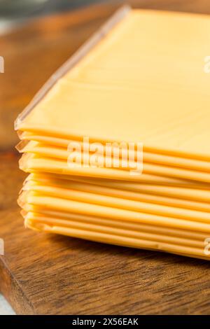 Yellow Cheddar American Cheese Singles in a Stack Stock Photo - Alamy