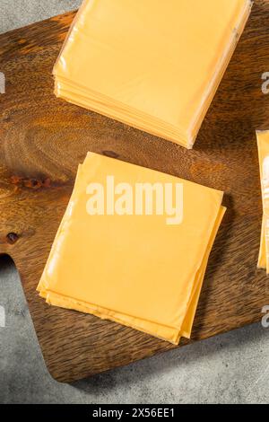 Yellow Cheddar American Cheese Singles in a Stack Stock Photo - Alamy