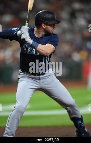 Seattle Mariners designated hitter Mitch Garver holds his 100th career home run ball during the ...