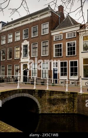 Dutch architectural window overlooking a canal in Delft, Netherlands ...