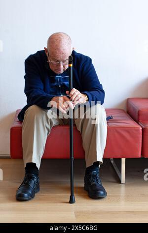 An upholstered bench provides a place for people to sit and ponder life ...
