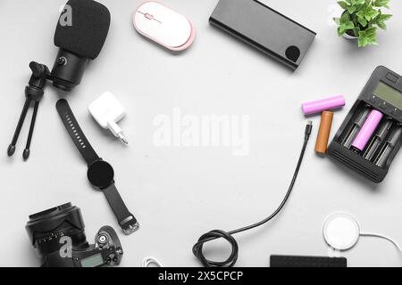 Frame made of different modern gadgets on color background Stock Photo ...
