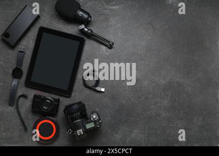 Set of different gadgets on dark background Stock Photo - Alamy