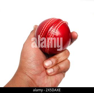 Bowler holding cricket ball in hand ; MR#201 Stock Photo - Alamy