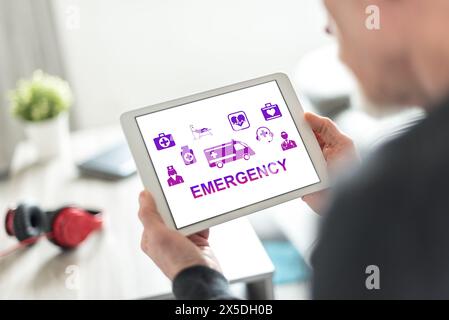 Tablet screen displaying an emergency concept Stock Photo - Alamy