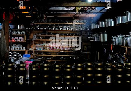 Traditional teahouse kitchen with tongba millet alcohol vessels on the ...