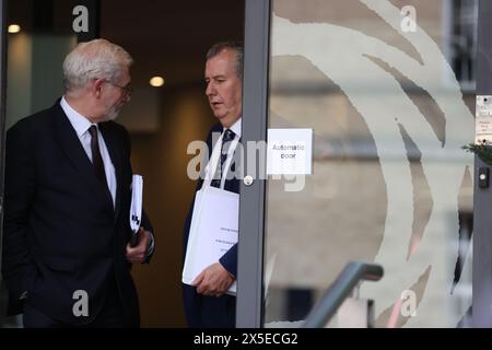 DUP MLA Edwin Poots (right) and solicitor John McBurney, leaving the ...