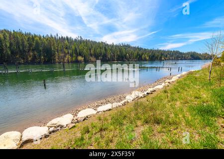 A small riverfront beach and park area along the Spokane River near ...