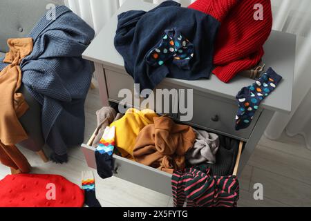 Cluttered room. Clothes in mess all around place Stock Photo - Alamy