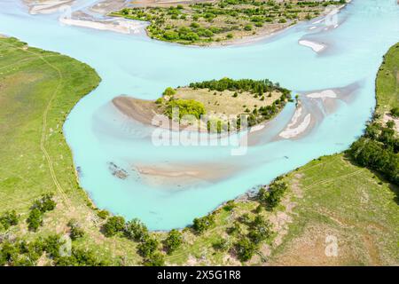 River Rio Baker west of village Cochrane, islands in the bending river ...