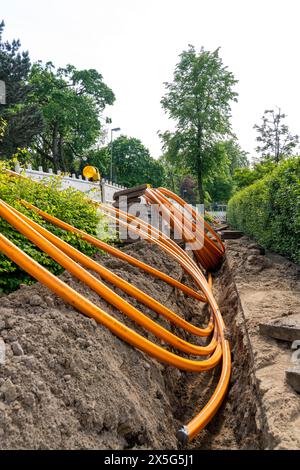Fiber optic cable laying in the grass ready to be installed at a ...