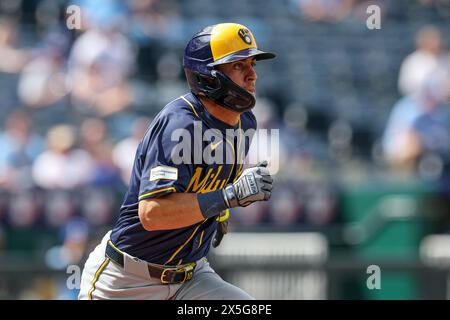 Milwaukee Brewers' Sal Frelick runs to first base during a baseball ...