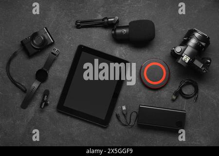 Set of different gadgets on dark background Stock Photo - Alamy