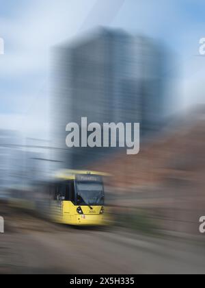 A Bee Network tram in Manchester travelling to Piccadilly. Shown here ...