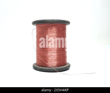 metallic embroidery thread reel isolated Stock Photo - Alamy