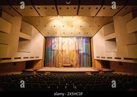 View of the main auditorium with colorful curtain. At the Soviet ...