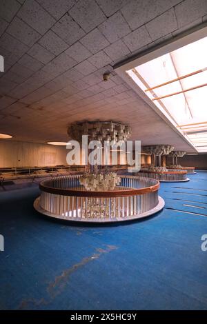 View of the upper lobby with holes for hanging, huge, glass chandeliers ...