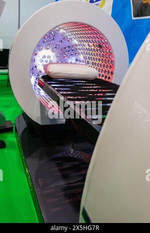 Vertical solarium in the shape of a futuristic capsule chair with LED ...