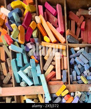 Colorful chalk pastels in box with palette knifes close up Stock Photo ...