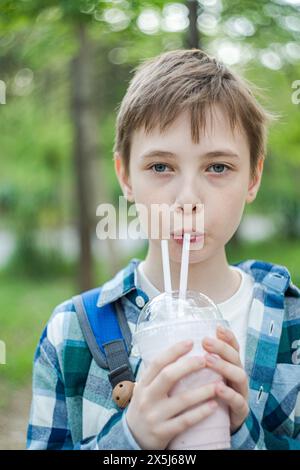 Nice teenager boy having fun outdoor Stock Photo - Alamy
