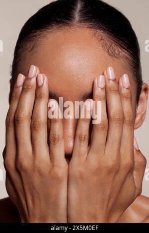 Back view headshot of unrecognizable adult Hispanic female with thick ...