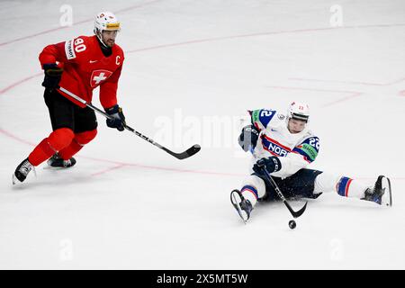 From left Martin Ronnild of Norway and goalkeeper Dominik Pavlat in ...