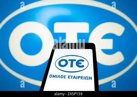 In this photo illustration, the OTE Telecom logo is displayed on a ...