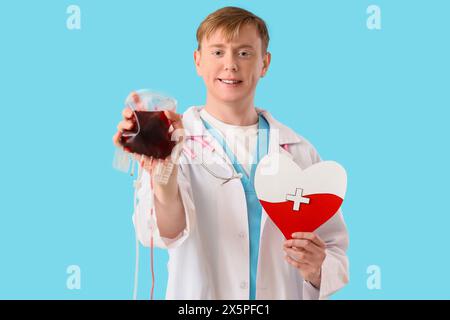 Blood pack for transfusion, heart and paper sheet with text WORLD BLOOD ...