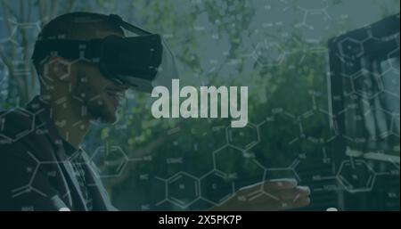 Image of chemical formulas over biracial men using vr headset Stock ...