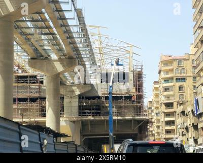 Cairo, Egypt, March 2 2024: A crane tower of Hassan Allam Co, A construction site of new high ...