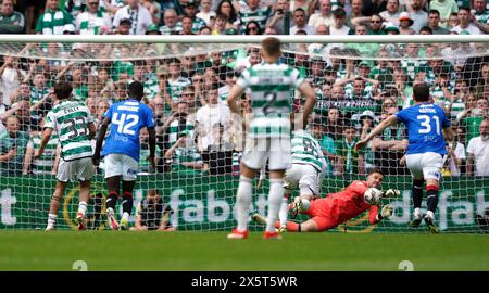 Rangers goalkeeper Jack Butland saves a penalty during the shoot out ...