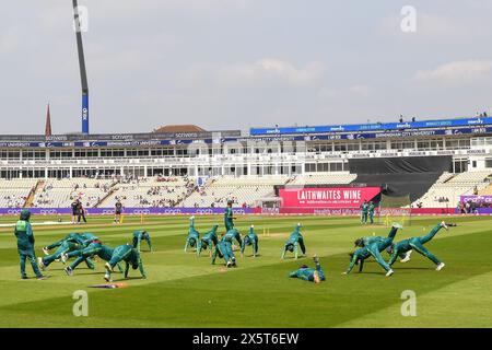 Players warm up ahead of the first day of the test match between ...