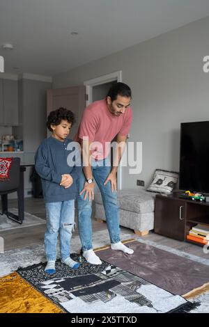 Father and son getting ready Stock Photo - Alamy