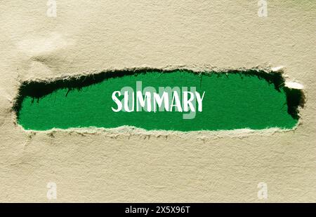 Summary word written on ripped paper with green background. Conceptual ...