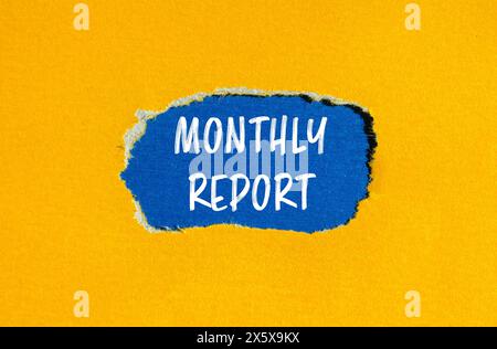 Monthly report words written on wooden blocks with green background ...