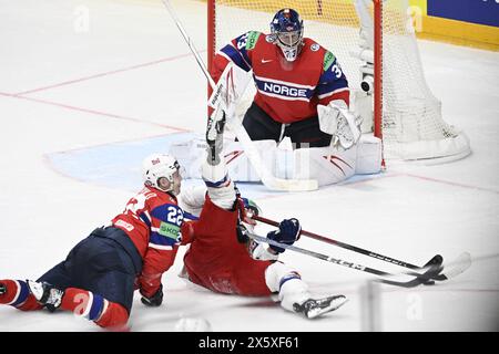From left Martin Ronnild of Norway and goalkeeper Dominik Pavlat in ...