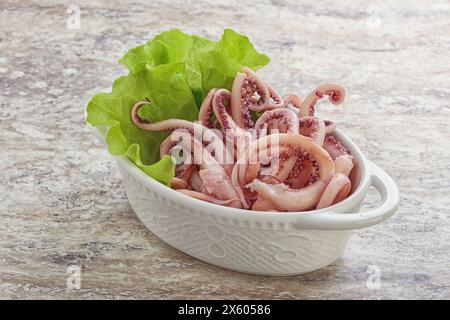 Marinated squid tentacles in the bowl for snack or salad Stock Photo ...