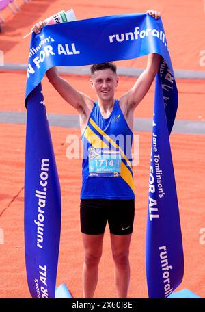 Joe Sagar celebrates winning the Rob Burrow Leeds Marathon. Picture ...