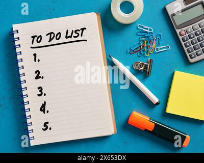 top view of notebook with tasks list on yellow Stock Photo - Alamy