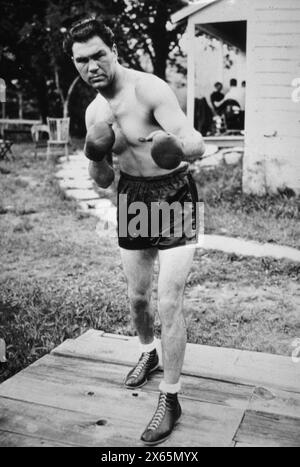 German Heavyweight boxer Max Schmeling with a face like a grim mask, on ...