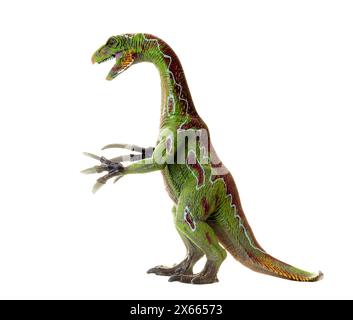 Toy dinosaur Therizinosaurus, a prehistoric creature, on transparent ...